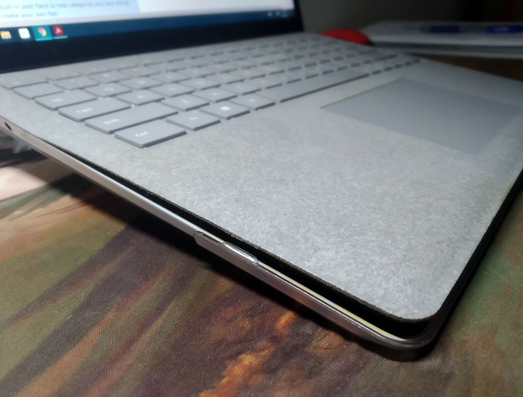 Surface Laptop keyboard popping out of casing - Microsoft Q&A
