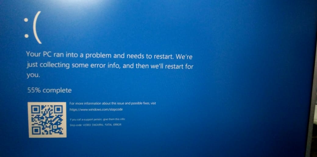 The computer screen shows a blue-screen stating that your pc ran into ...