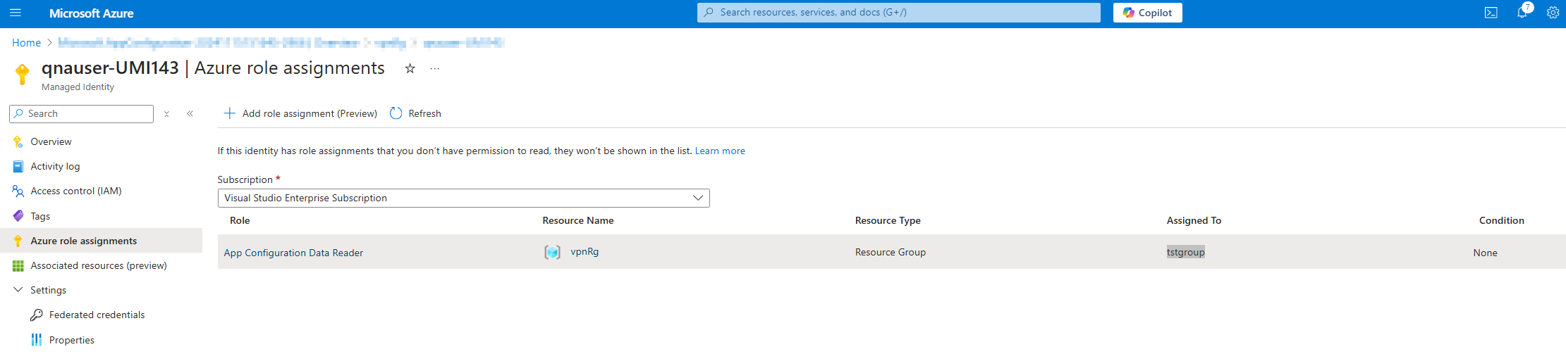 Managed identity role assignment showing "assigned to" an Entra group ...